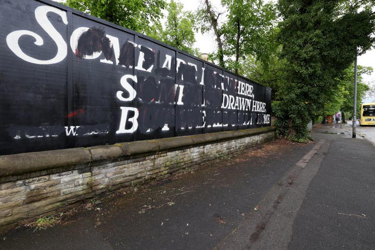 Anger as mural opposite Manchester hotel at centre of furious protests ...