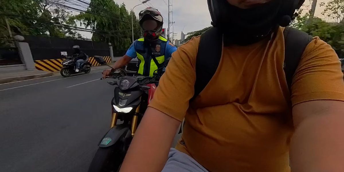LTO suspends license of viral cop who pushed fellow rider