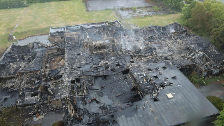 Second teenage boy arrested after fire at school