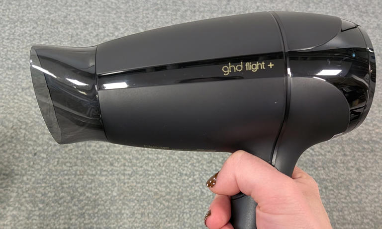 This tiny travel hair dryer fits into any bag - it's just as good as a ...