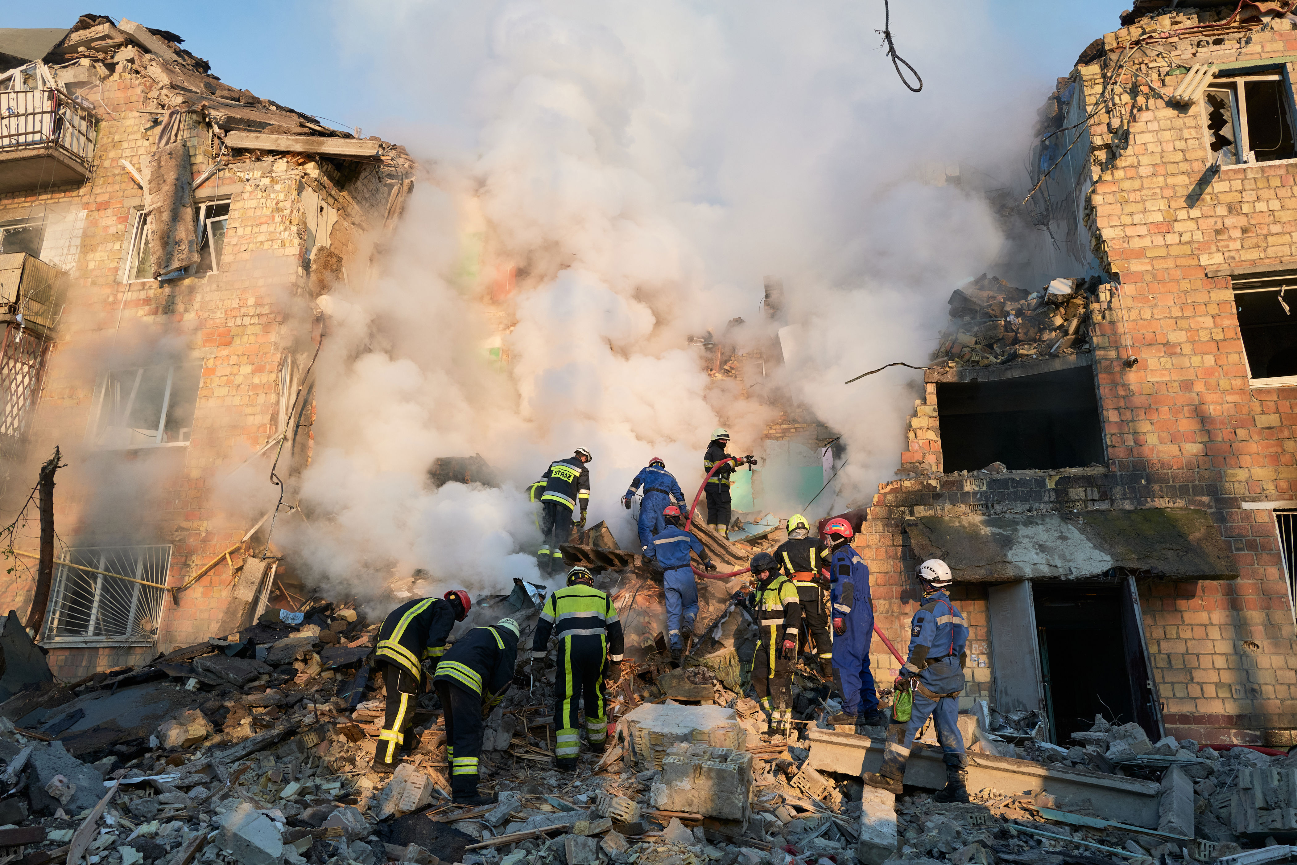 Russian attack on Kyiv kills at least 3 as emergency crews search rubble