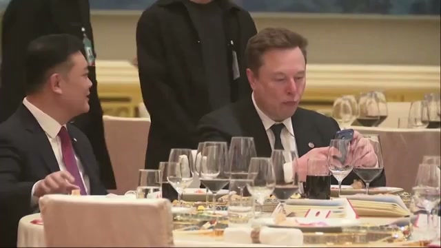 Elon Musk pulls strange faces while taking selfies on China trip