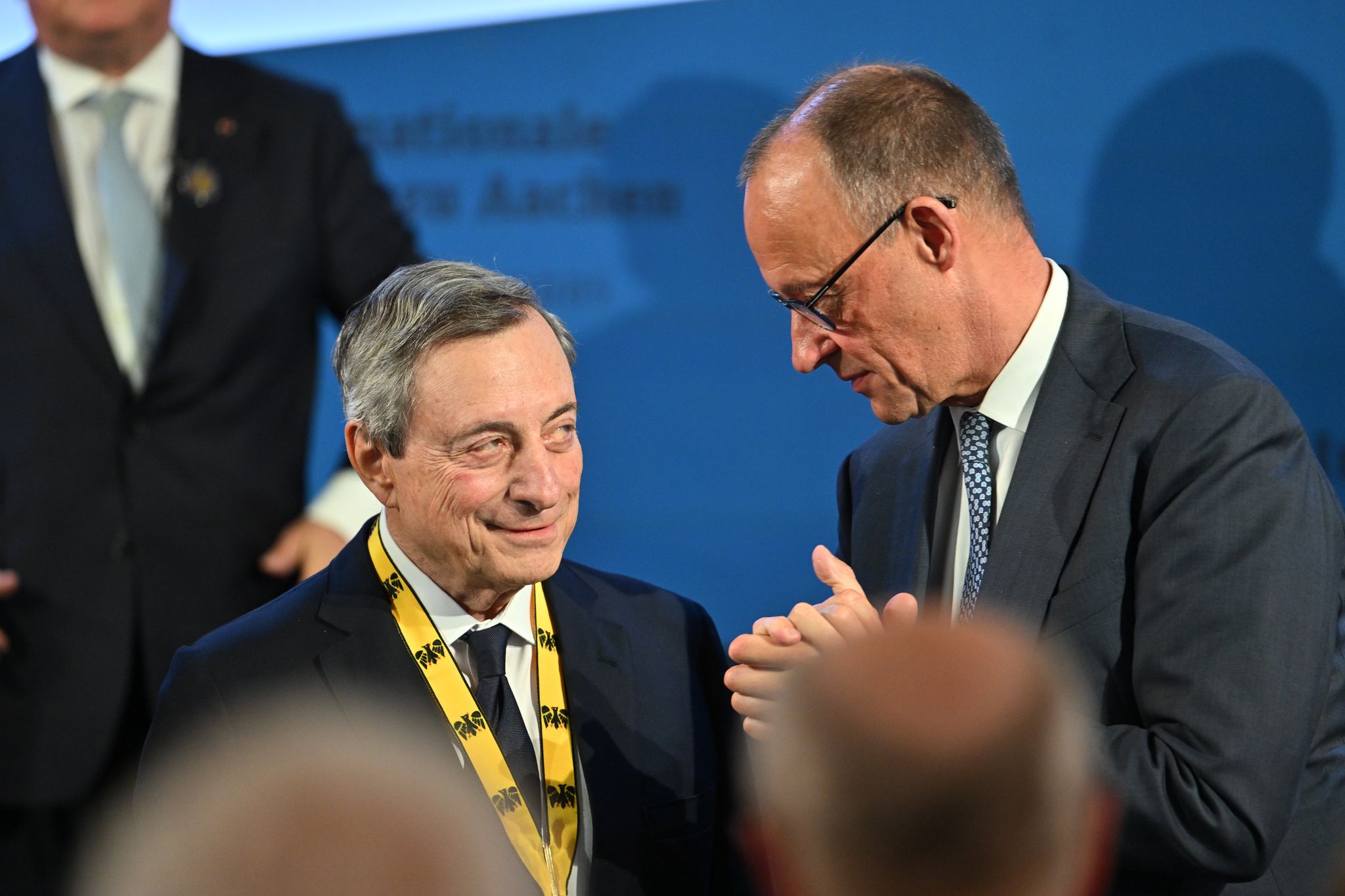 Merz hails 'Super Mario' Draghi as ex-ECB boss given Charlemagne Prize
