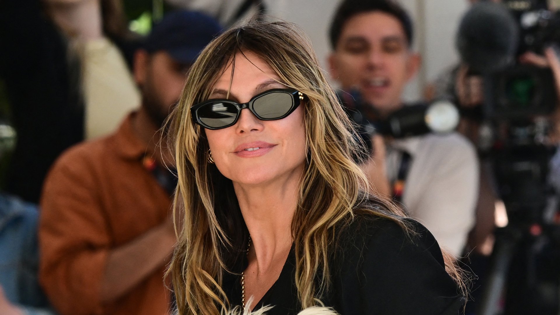Forget Heidi Klum's sheer top - we're looking at her chic loafers style