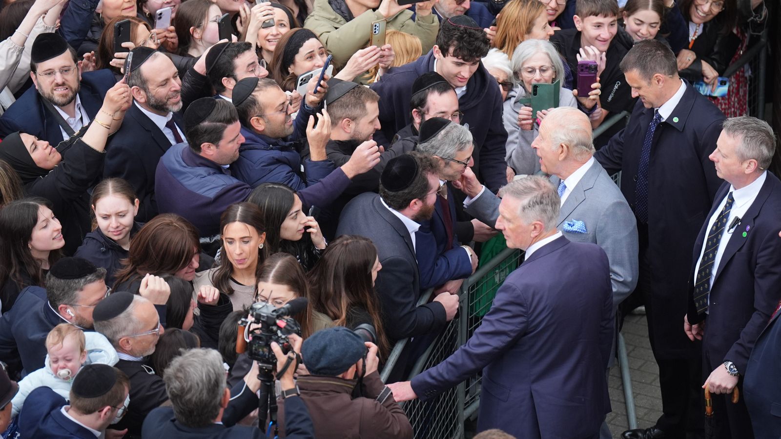 'He didn't let go of my hand': King meets victims of stabbing attack in ...