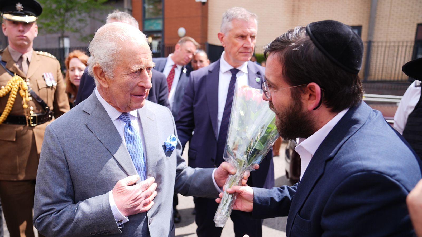 'He didn't let go of my hand': King meets victims of stabbing attack in ...