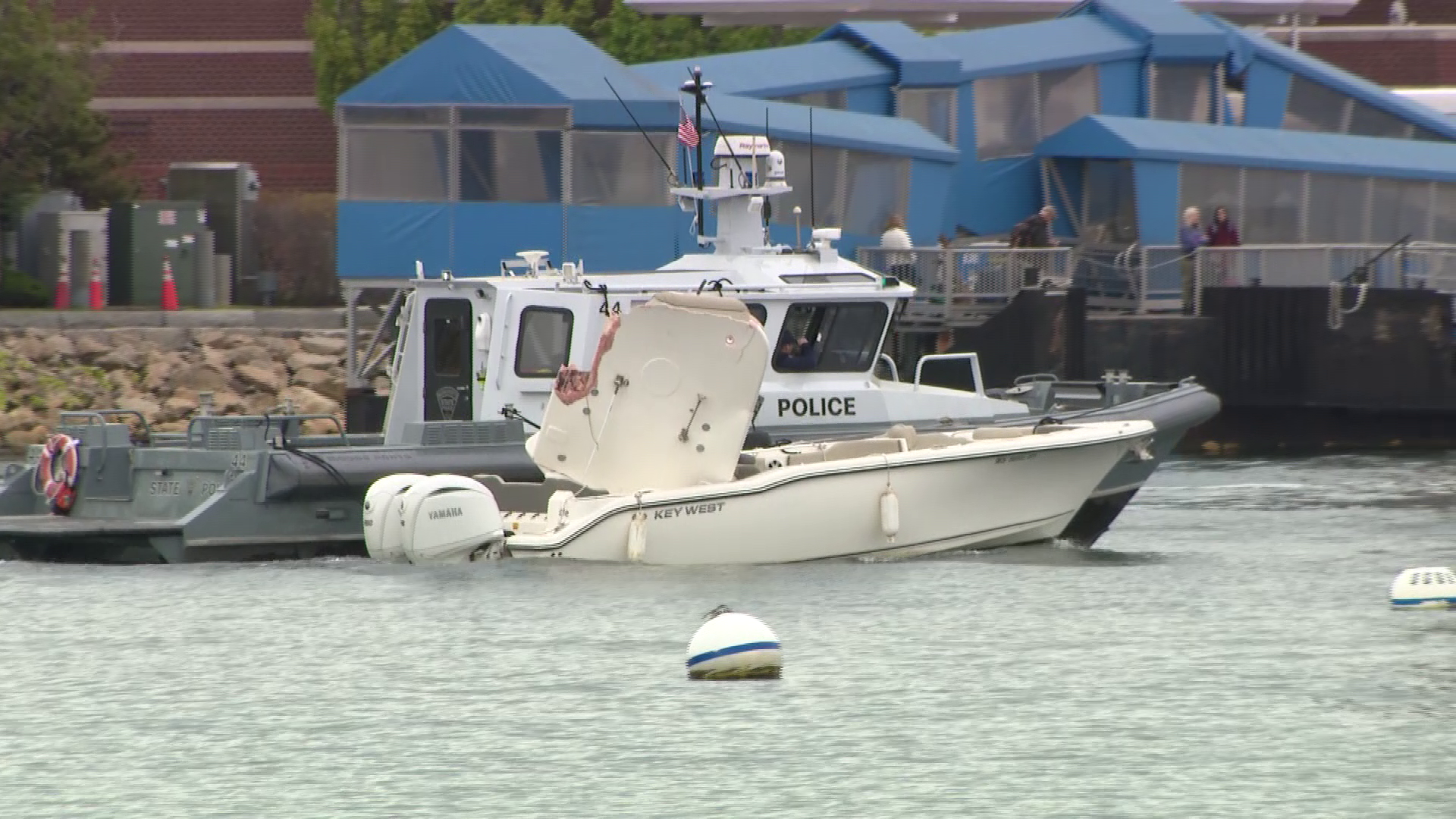 Woman dead, 3 others injured when boat crashes into Logan pier