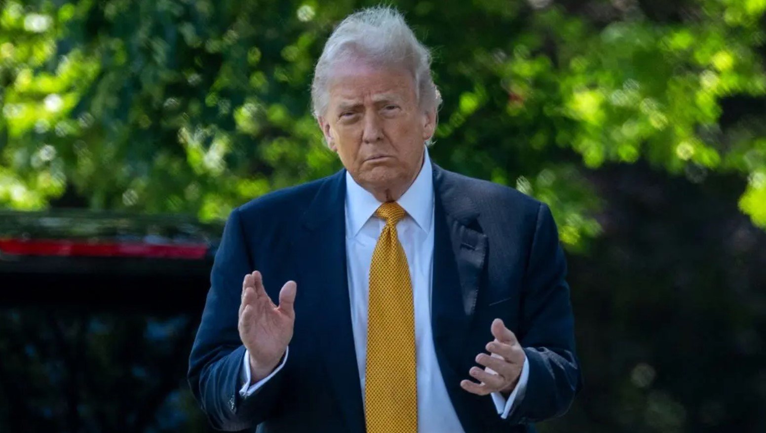 Donald Trump’s receding hairline exposed during windy departure to ...