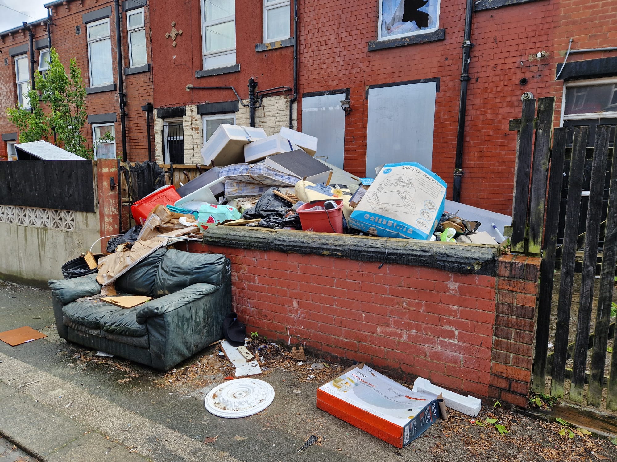 Leeds neighbours demand removal of 'appalling' fly-tipping pile being ...