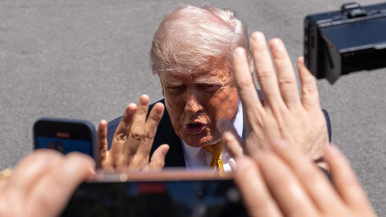 Donald Trump's 'gnarly' hand goes viral after landing in China as ...