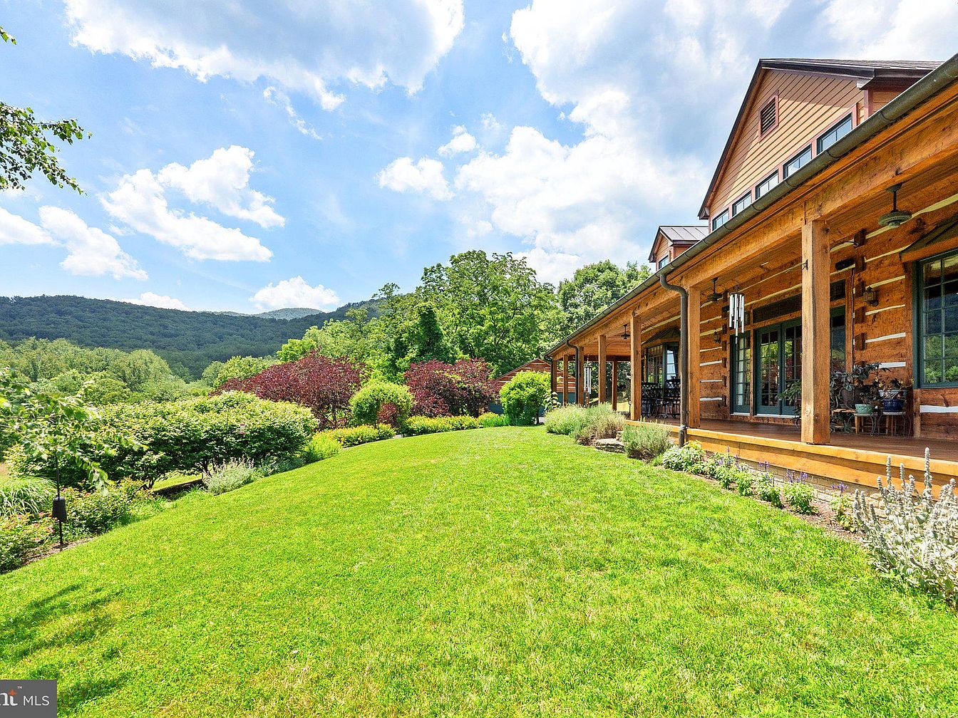 Explore a 1999 handmade log home in Huntly, Virginia, featuring 15-foot ...