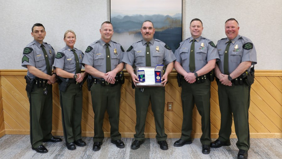 DNR conservation officer awarded Medal of Valor for response to Grand ...