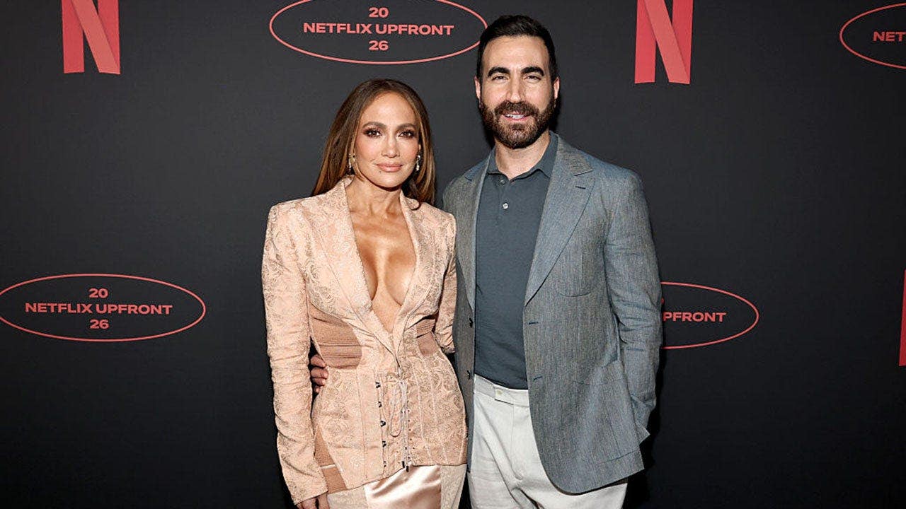 Jennifer Lopez's dress holds on for dear life at her Netflix event ...