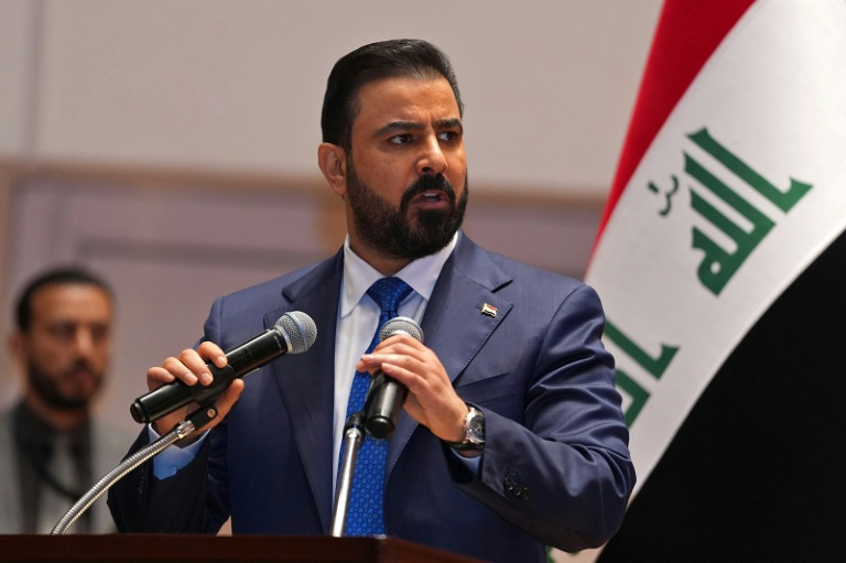 Iraq PM vows monopoly on arms as parliament approves government