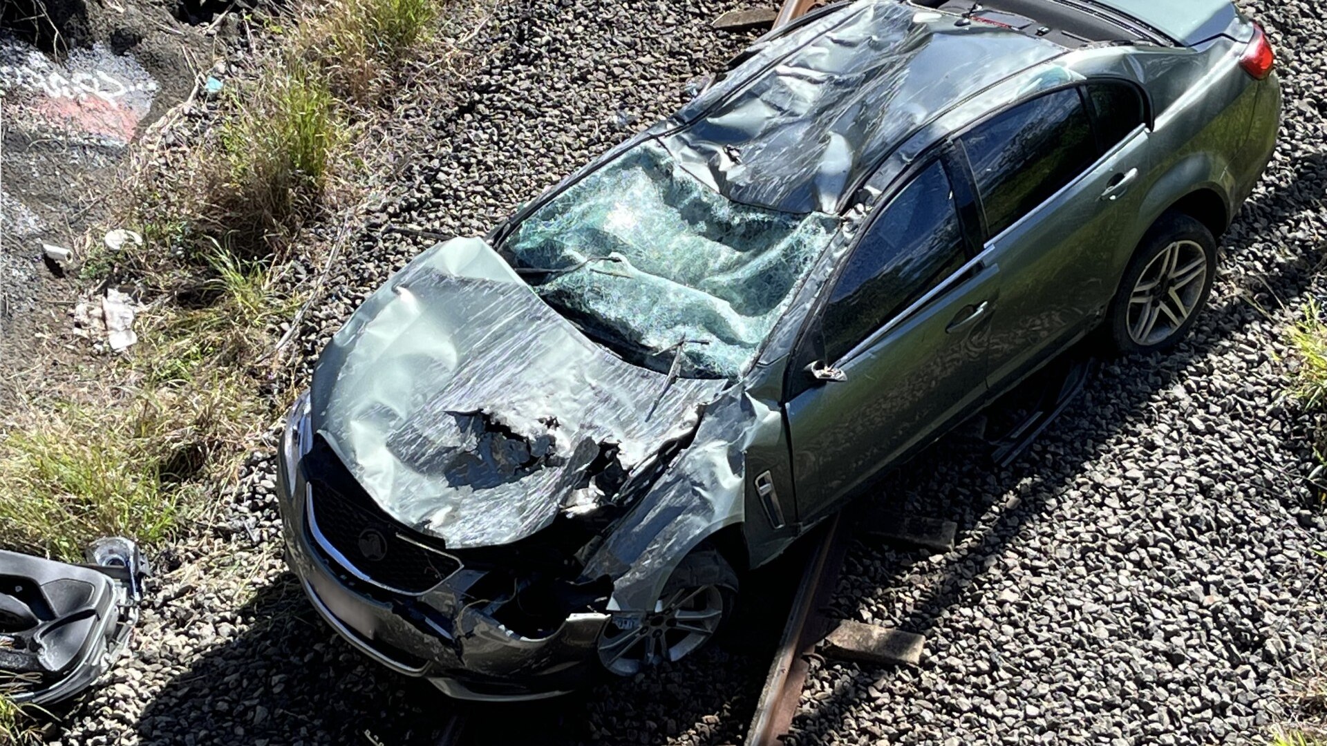 Driver dies after car rolls over onto railway line at Kulangoor