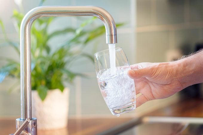 A new report finds 1 in 5 Americans may be drinking unsafe tap water ...