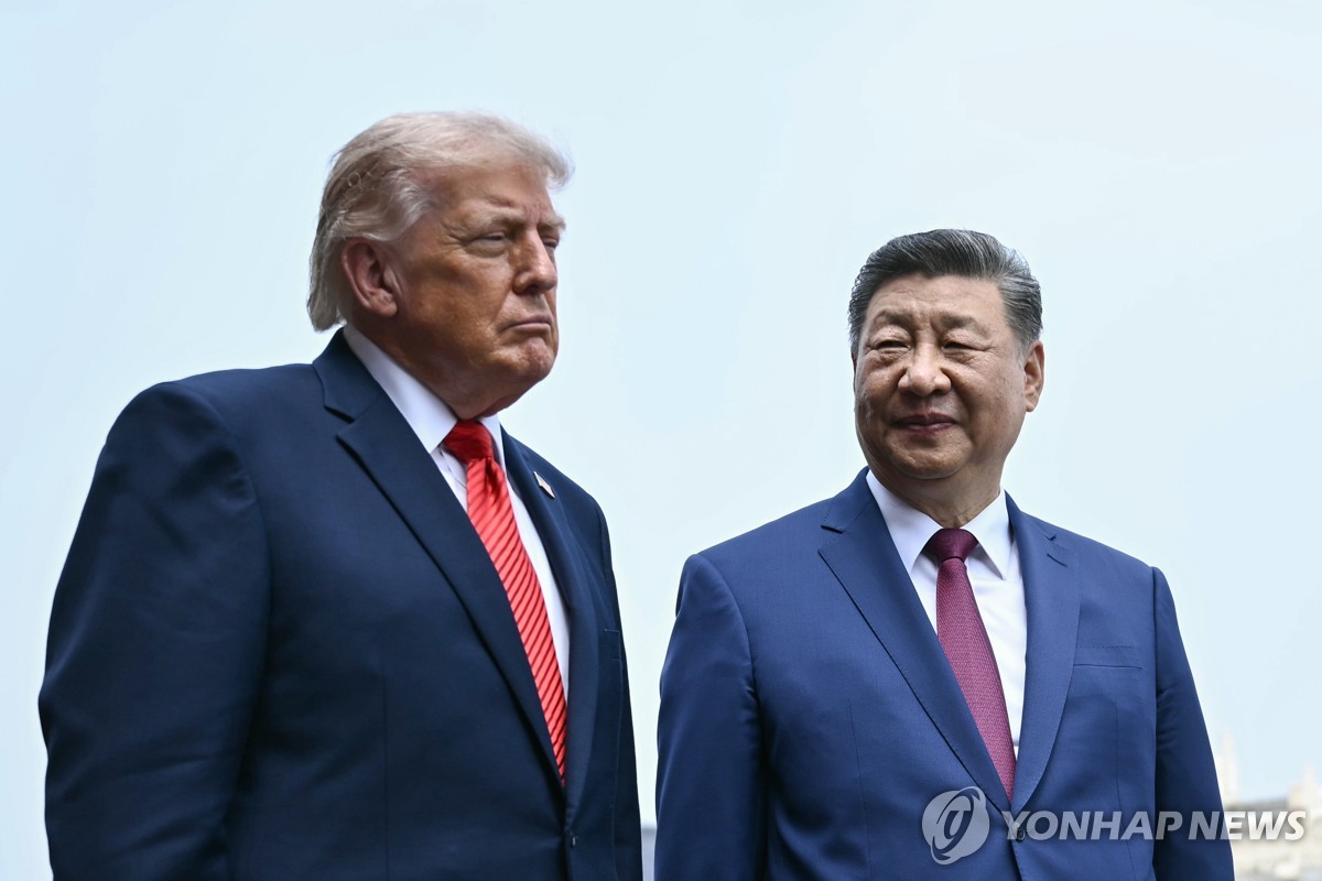 (LEAD) Trump, Xi begin second, final day of talks in Beijing