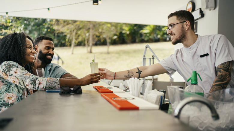 How to get great service at any bar, according to industry experts