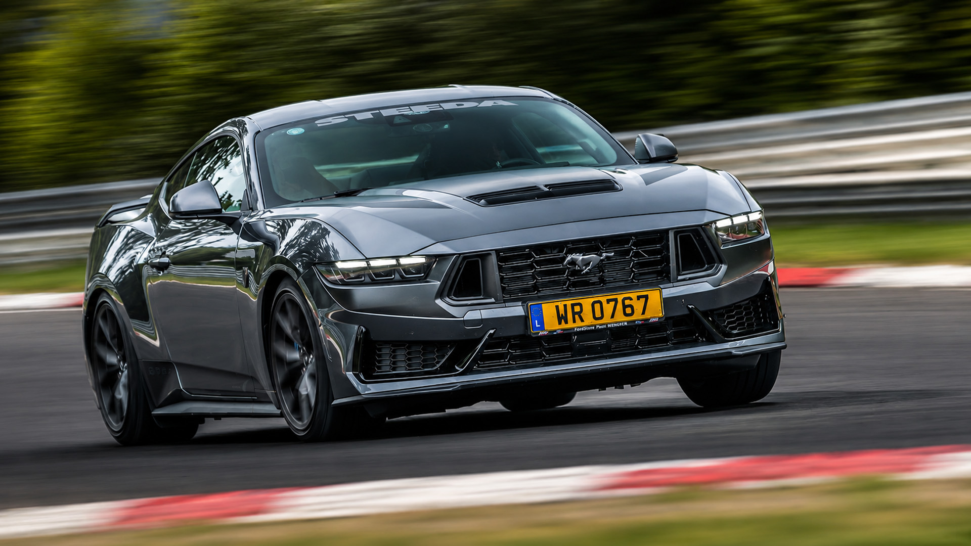 Steeda Q767 shows muscle power on track