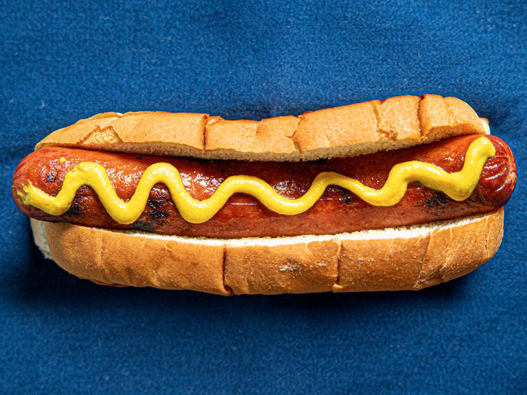 We taste-tested 15 yellow mustards—these are the 3 going on our hot dogs