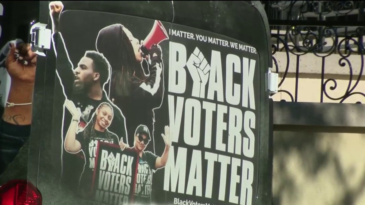 Georgia protesters march against new voting maps