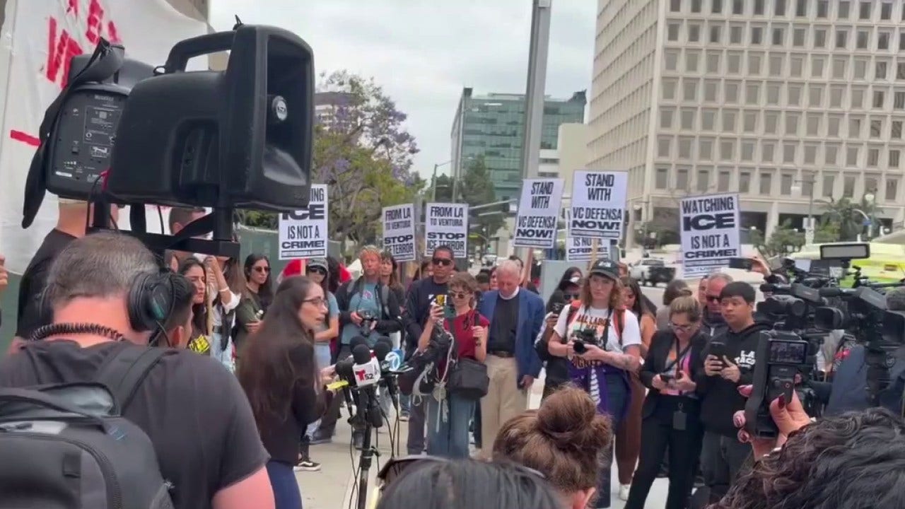 Anti-ICE activists rally in downtown LA after federal search warrants ...