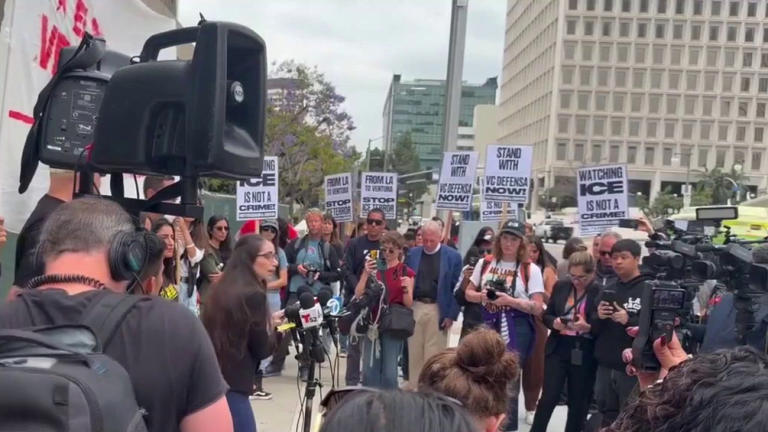 Anti-ICE activists rally in downtown LA after federal search warrants ...