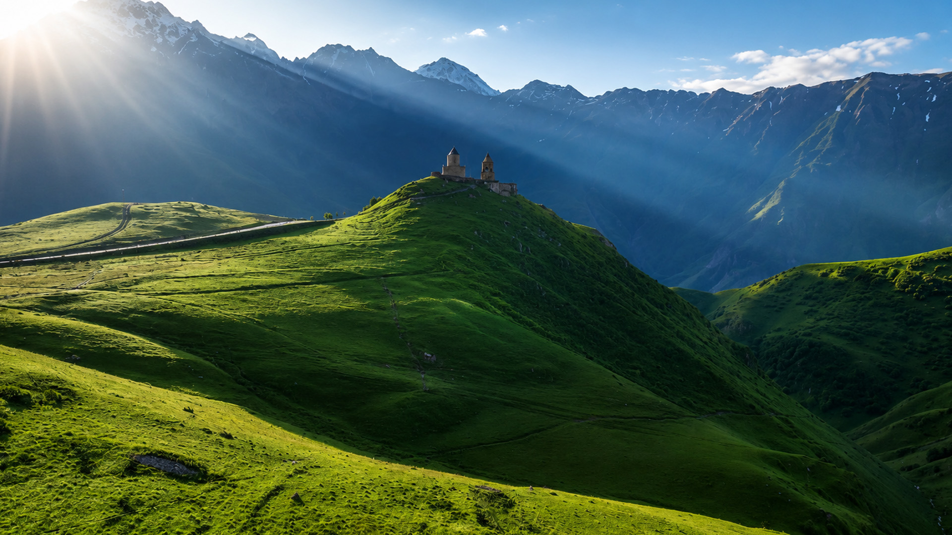 A church above empty mountain roads