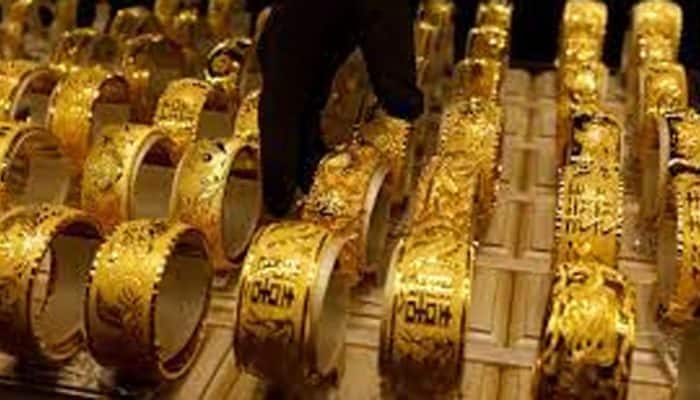 Gold, silver tumble up to 4% amid stronger dollar, rising crude prices