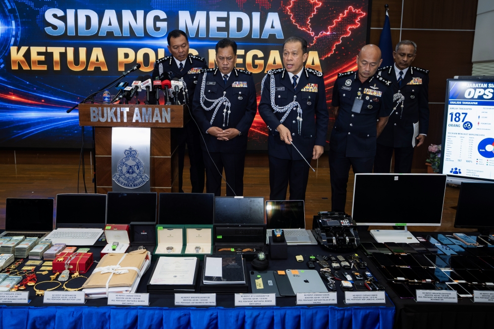 RM57m in luxury houses, handbags, watches, cars seized as police crack ...