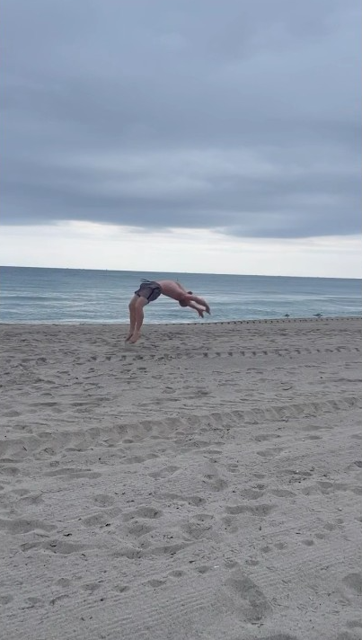 Beach flips epic style tricks in the sand & waves