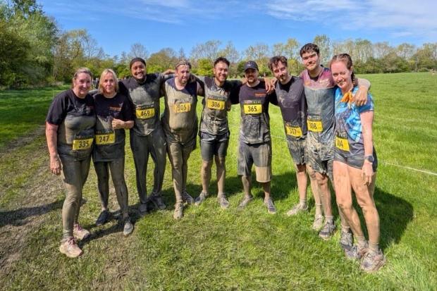 Mud, sweat and tears as Swindon staff raise more than £2,000