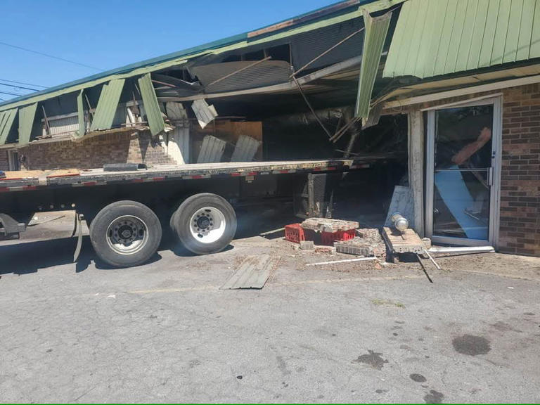 Semi-truck crashes into Albertville business; no injuries reported