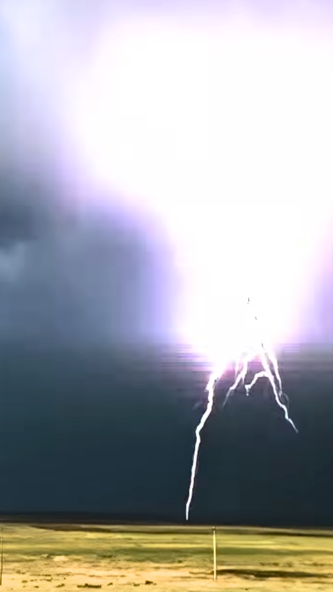 Wild lightning bolt from chaotic storm sky