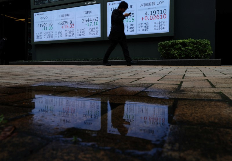 Global bonds tumble as flaring inflation spooks investors