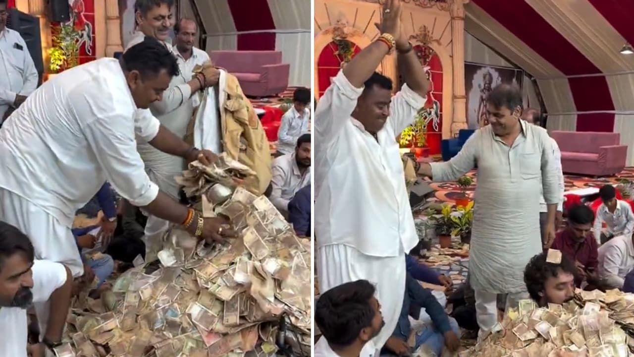 Viral video: Devotees rain cash on Gujarat bhajan singer, internet left ...