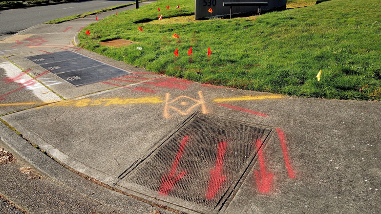 What should you do if you find utility markings on your driveway?
