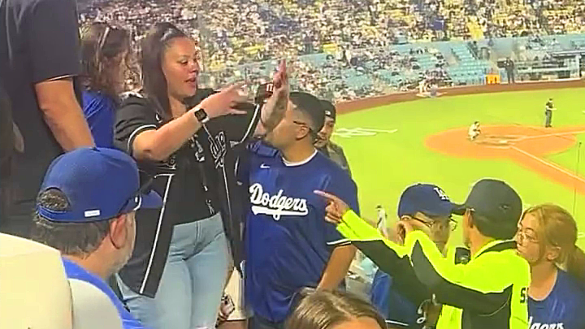 Dodger Stadium violence escalates as fans throw punches and flash gang ...