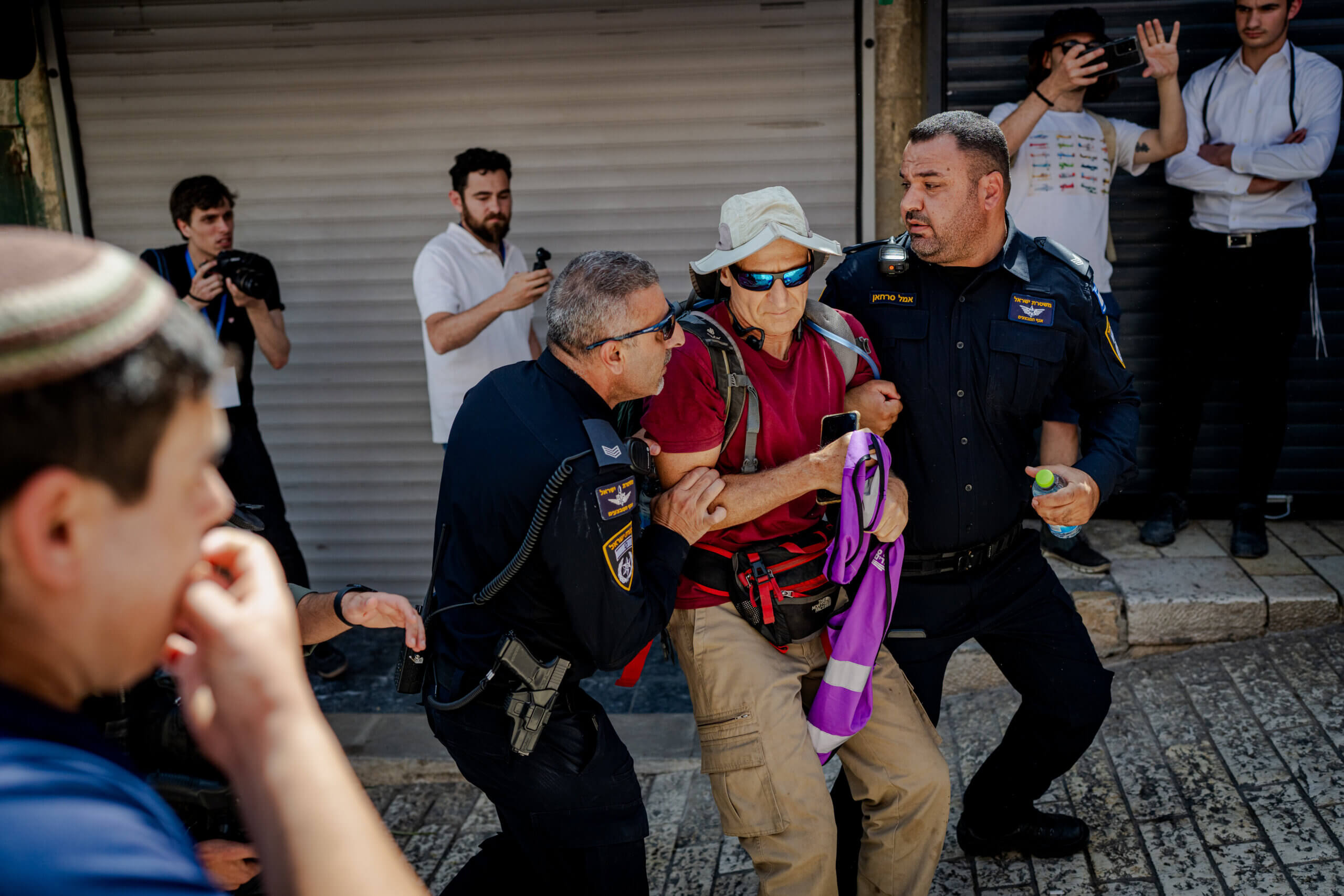 Amid Jerusalem’s flag march, police remove activists aiding Palestinians
