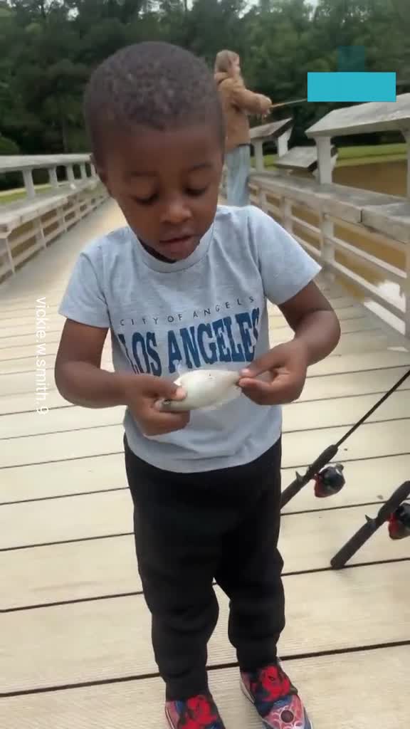 Dad Lets Young Son Throw Fish Back, But Goes Very Wrong