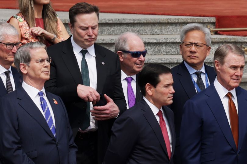 Elon Musk rudely breaks formation in China moment caught on camera