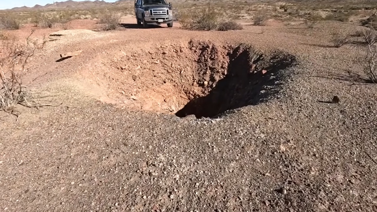 He threw a rock into the hole - then heard water deep under the desert