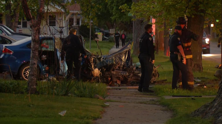 Police rescue woman from burning car