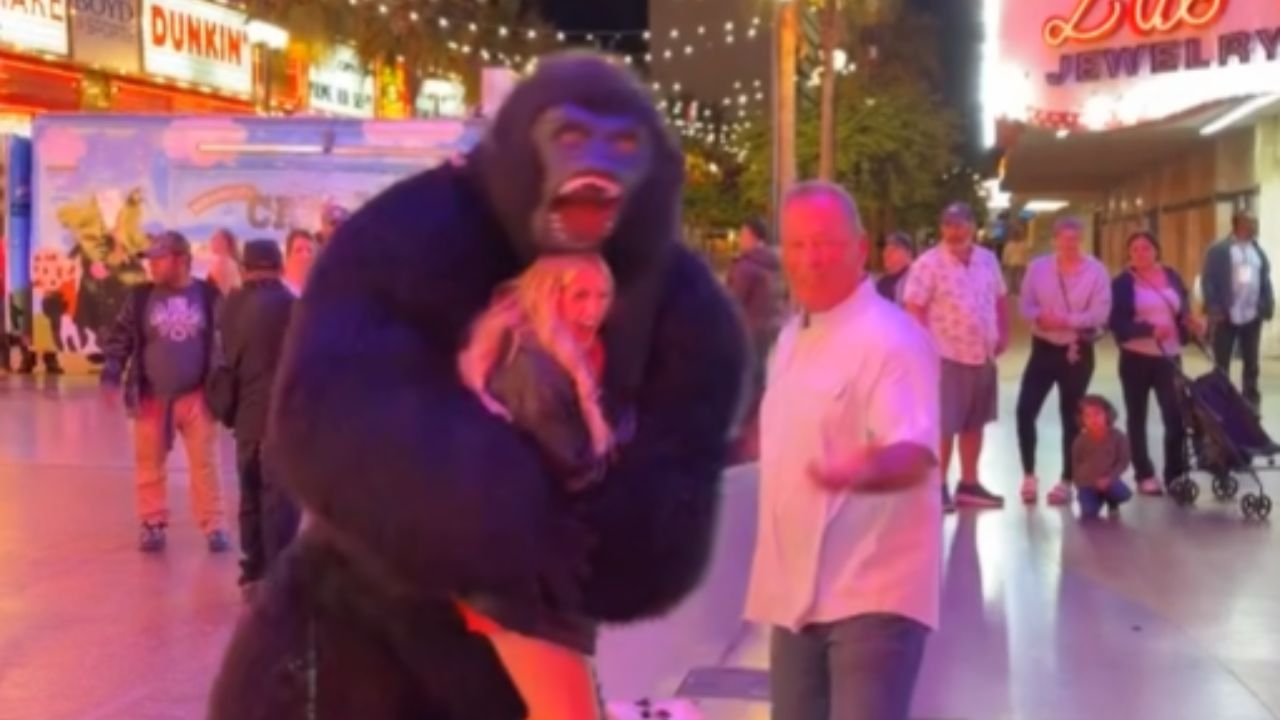 Woman twirled by costumed Donkey Kong in Las Vegas