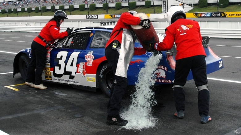 How big is a NASCAR fuel tank & how much gas does the car burn during ...