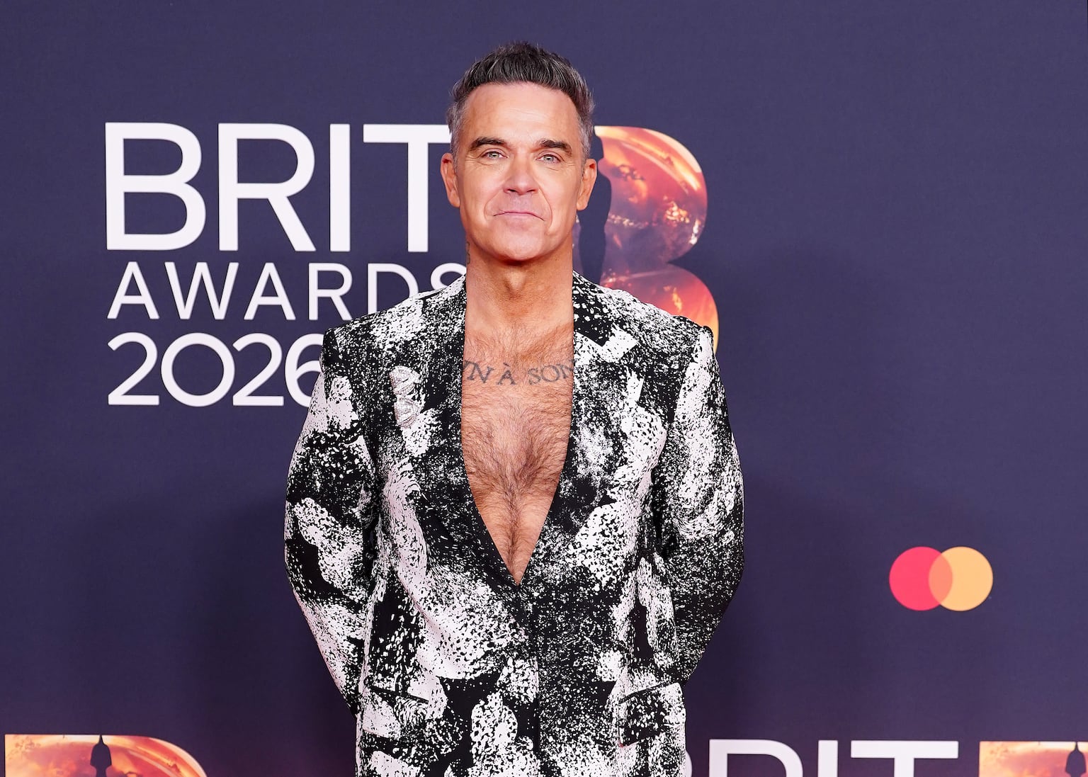 Robbie Williams to perform Soccer Aid half-time show for its 20th ...