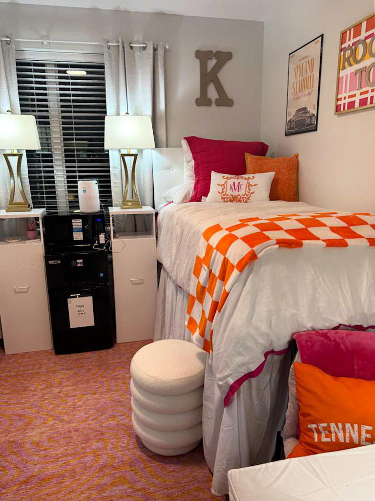 In this game-day glam dorm room, orange is the hero color