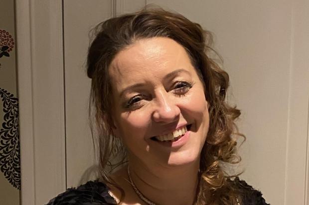 Woman who lost three stone while working at 30,000 feet gives back