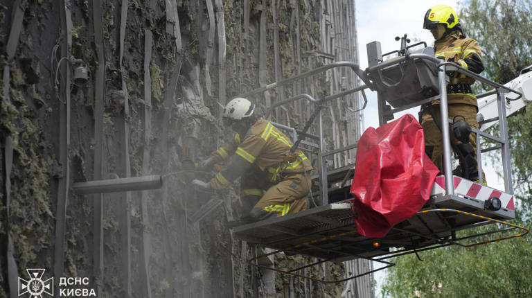 Search and rescue operations at site of Russian strike on Kyiv high ...