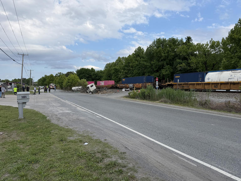 Video shows train hit septic truck in Chesapeake; driver seriously injured